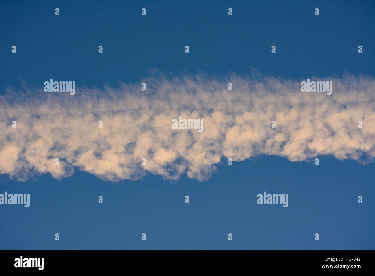 vapor trails or chemtrails from jets in sky Stock Photo - Alamy