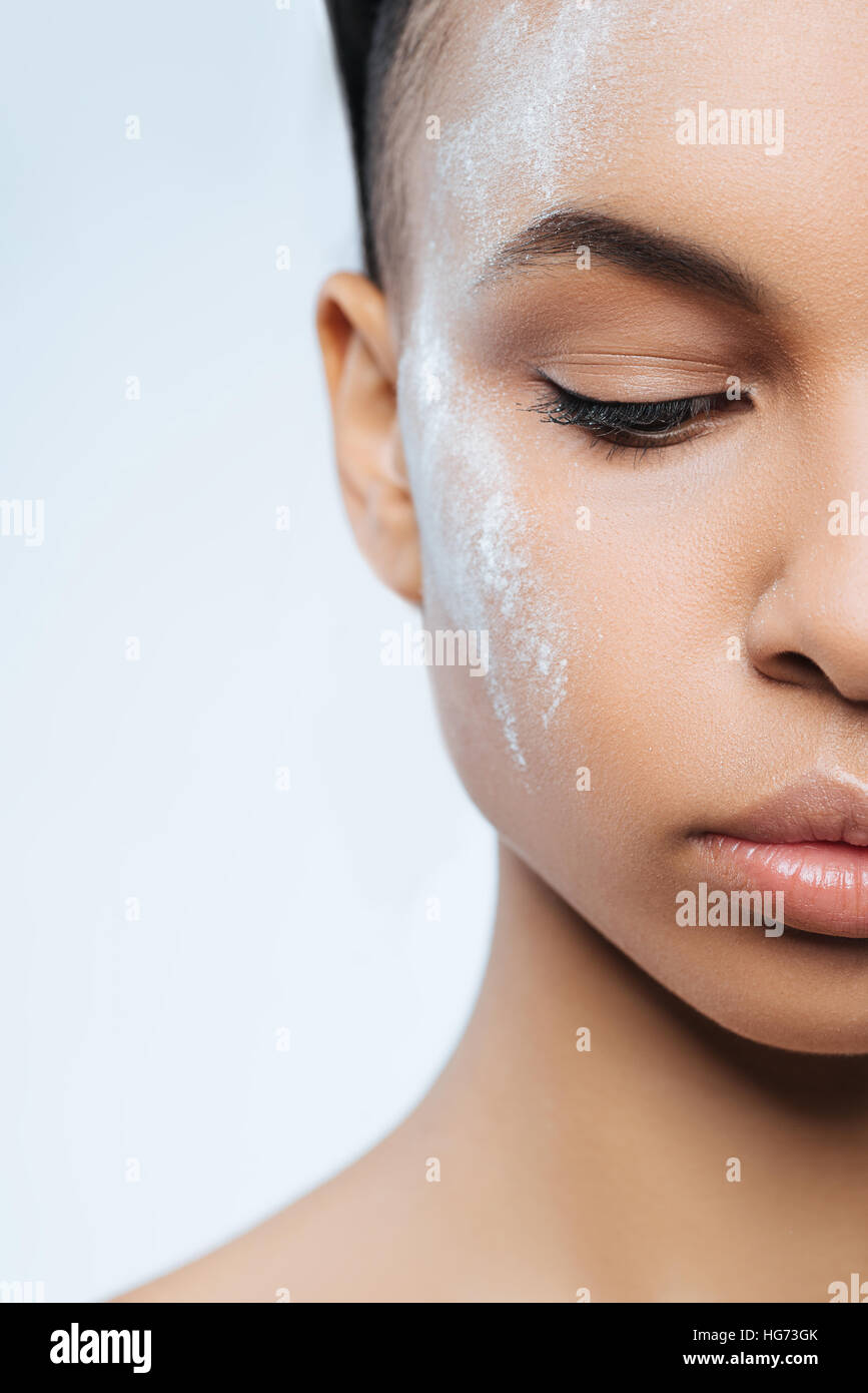 Attractive pleasant woman having white powder on her face Stock Photo ...