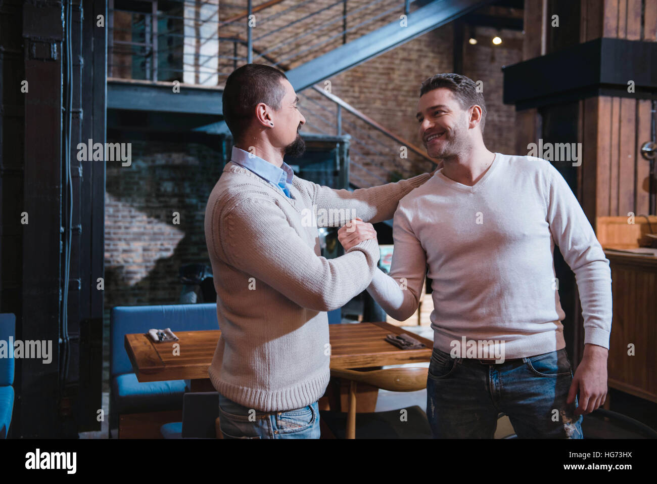 Men greeting each other hi-res stock photography and images - Alamy