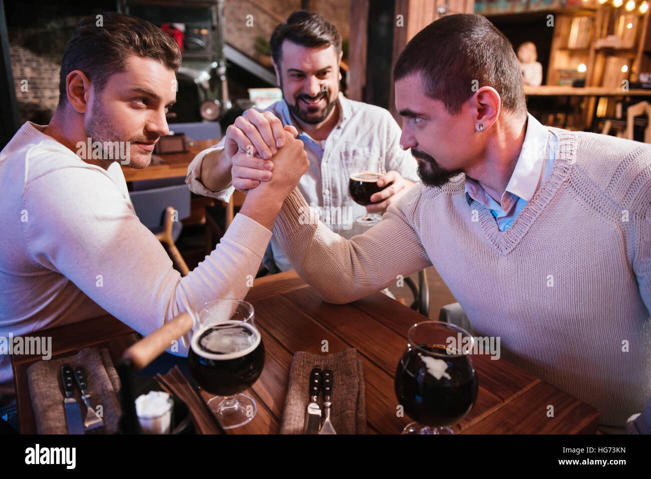 Handsome brutal men confronting each other Stock Photo - Alamy