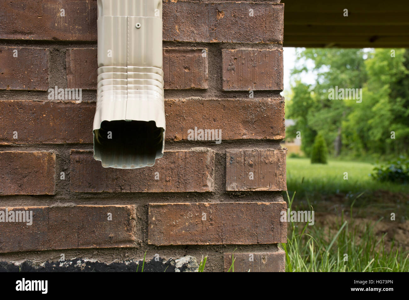 Water Spout On A House