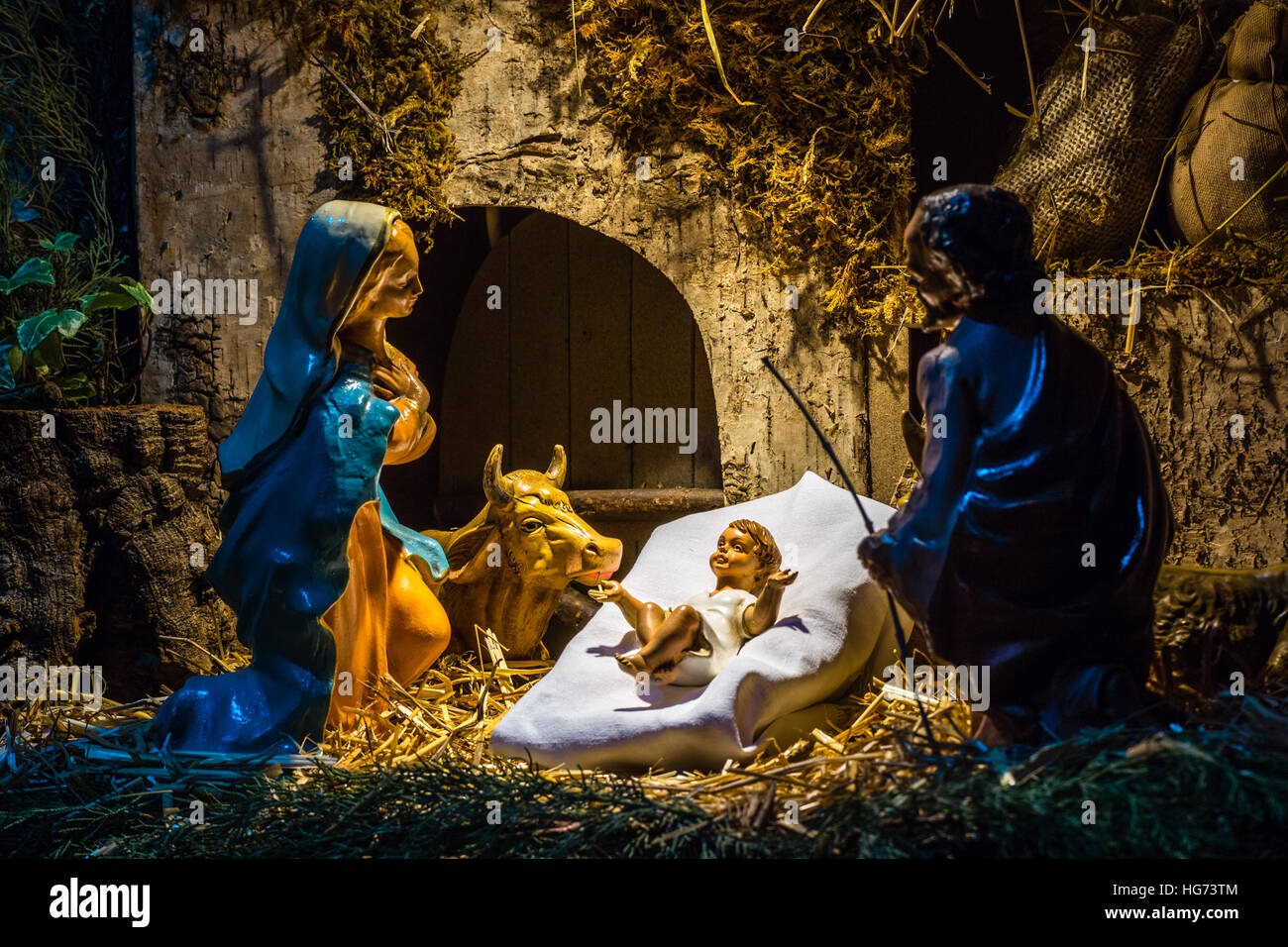 Christmas Nativity scene of baby Jesus in the manger with Saint Joseph ...