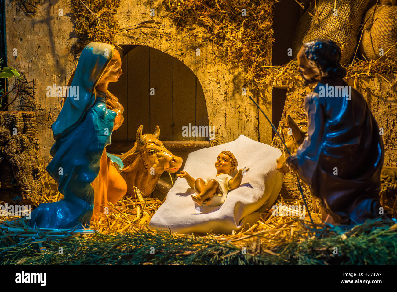 Christmas Nativity scene of baby Jesus in the manger with Saint Joseph ...