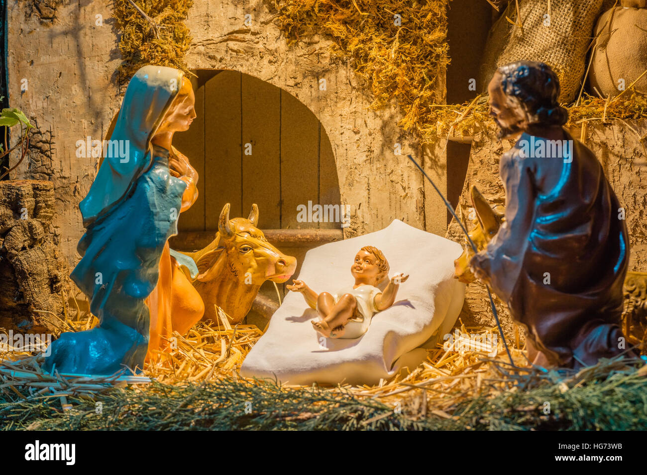 Christmas Nativity scene of baby Jesus in the manger with Saint Joseph ...