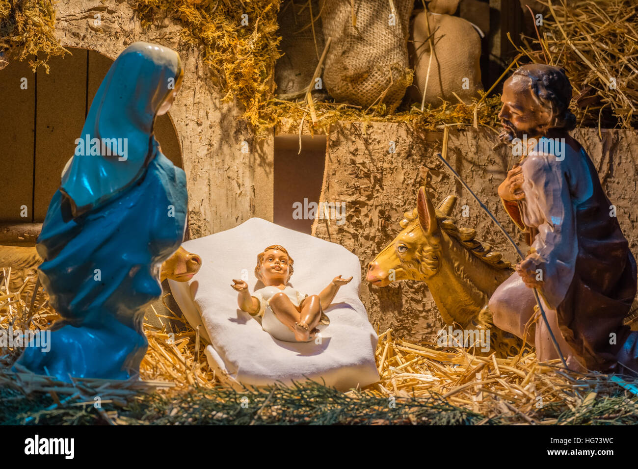 Christmas Nativity scene of baby Jesus in the manger with Saint Joseph ...