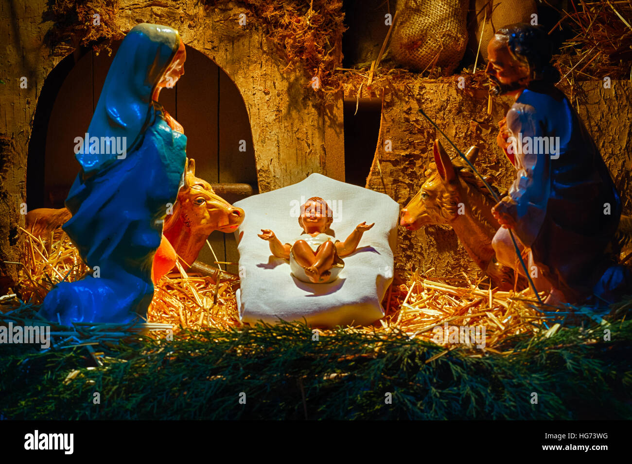 Christmas Nativity scene of baby Jesus in the manger with Saint Joseph ...