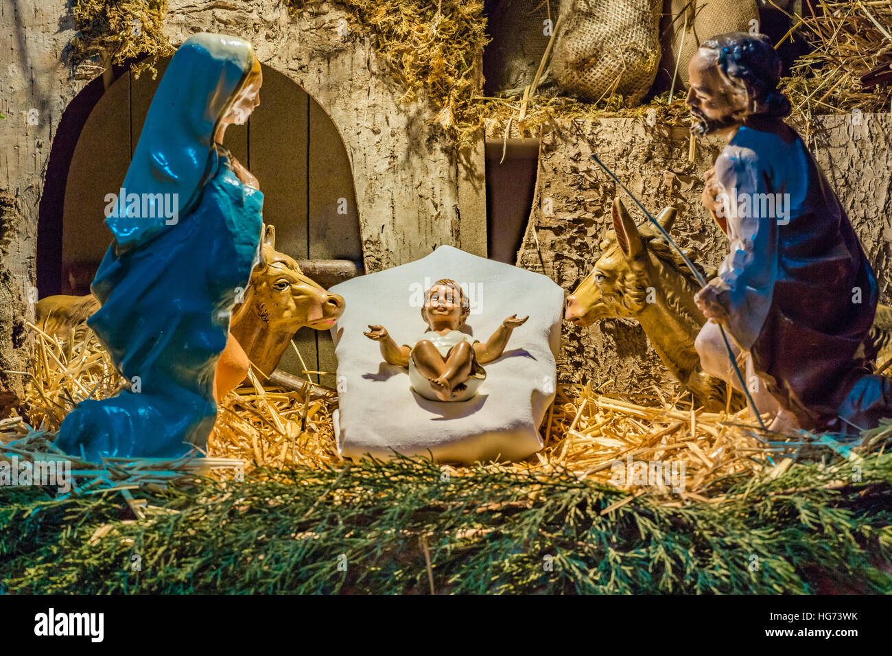 Christmas Nativity scene of baby Jesus in the manger with Saint Joseph ...