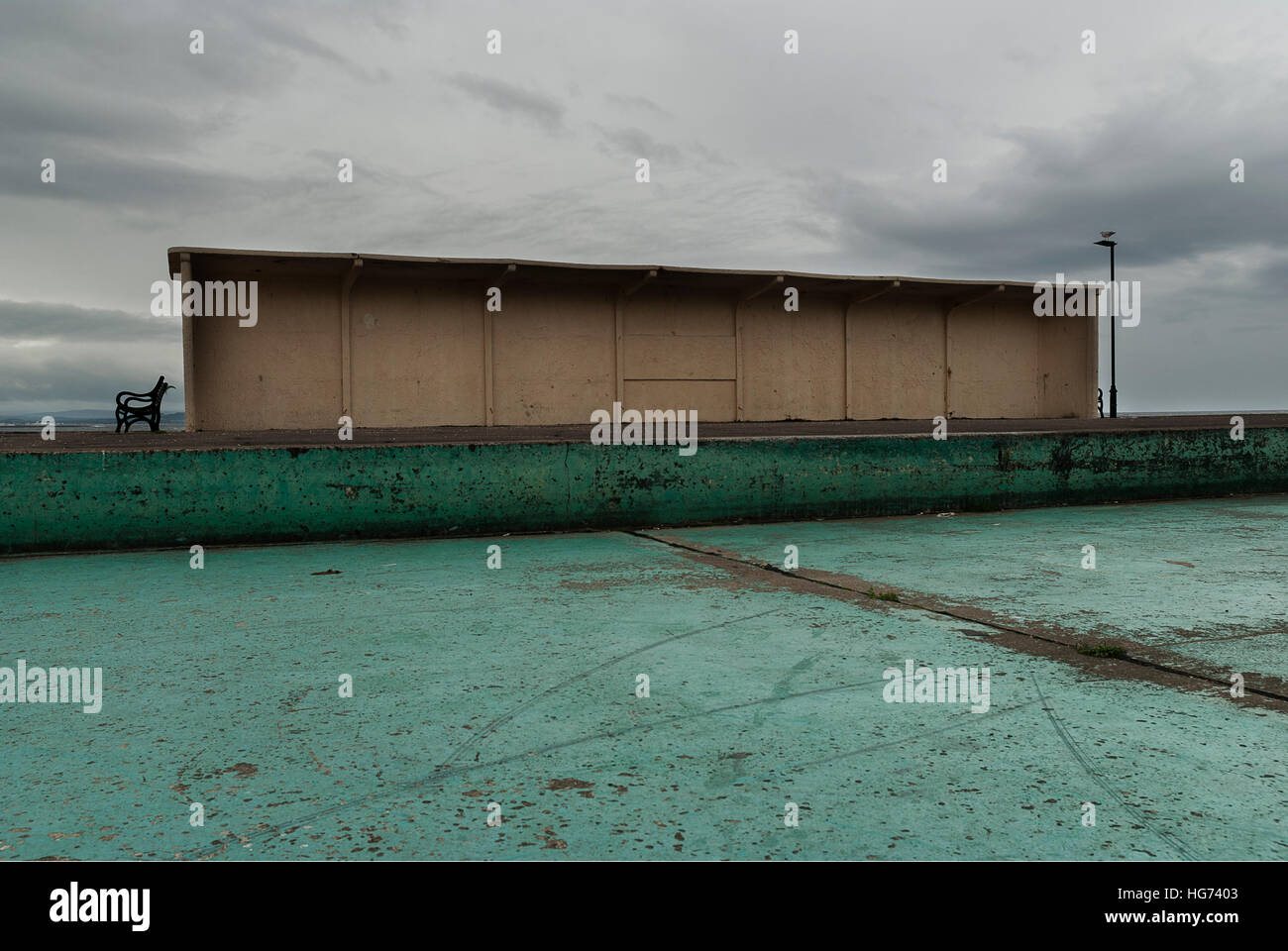 Abandoned outdoor swimming pool on dull day Stock Photo - Alamy