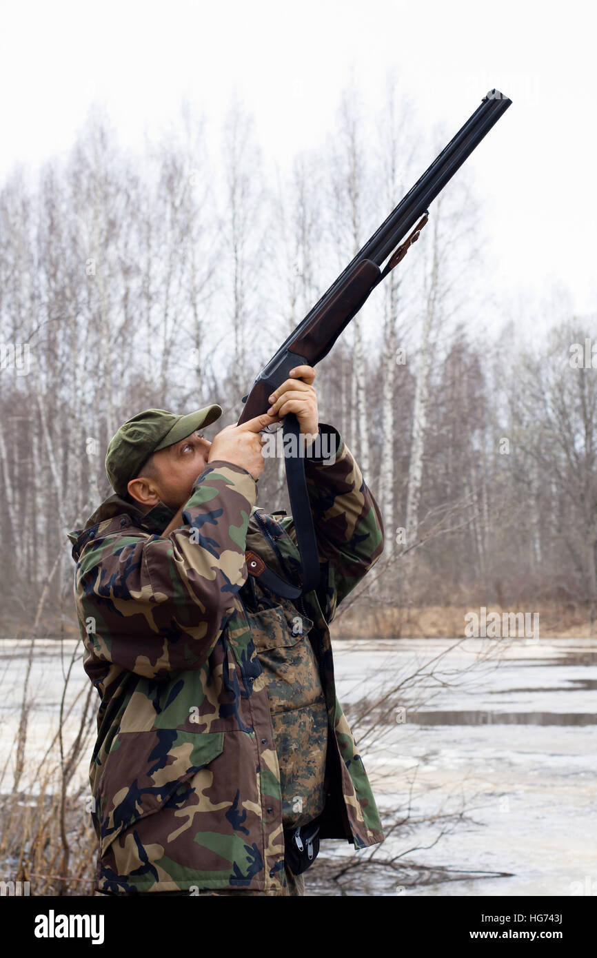 hunter aiming at duck Stock Photo - Alamy