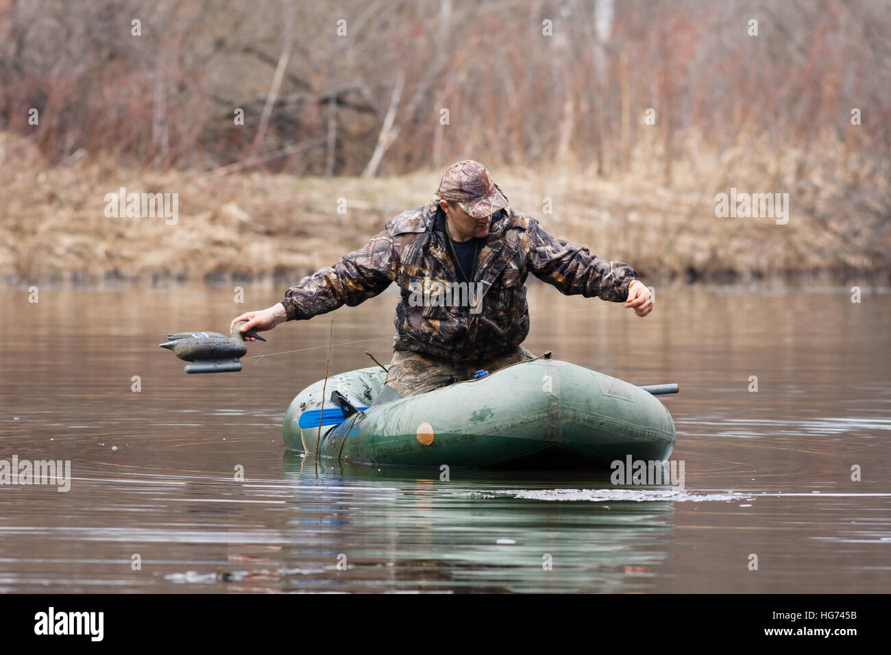 hunter puts stuffed duck on water hunter puts stuffed duck on water ...