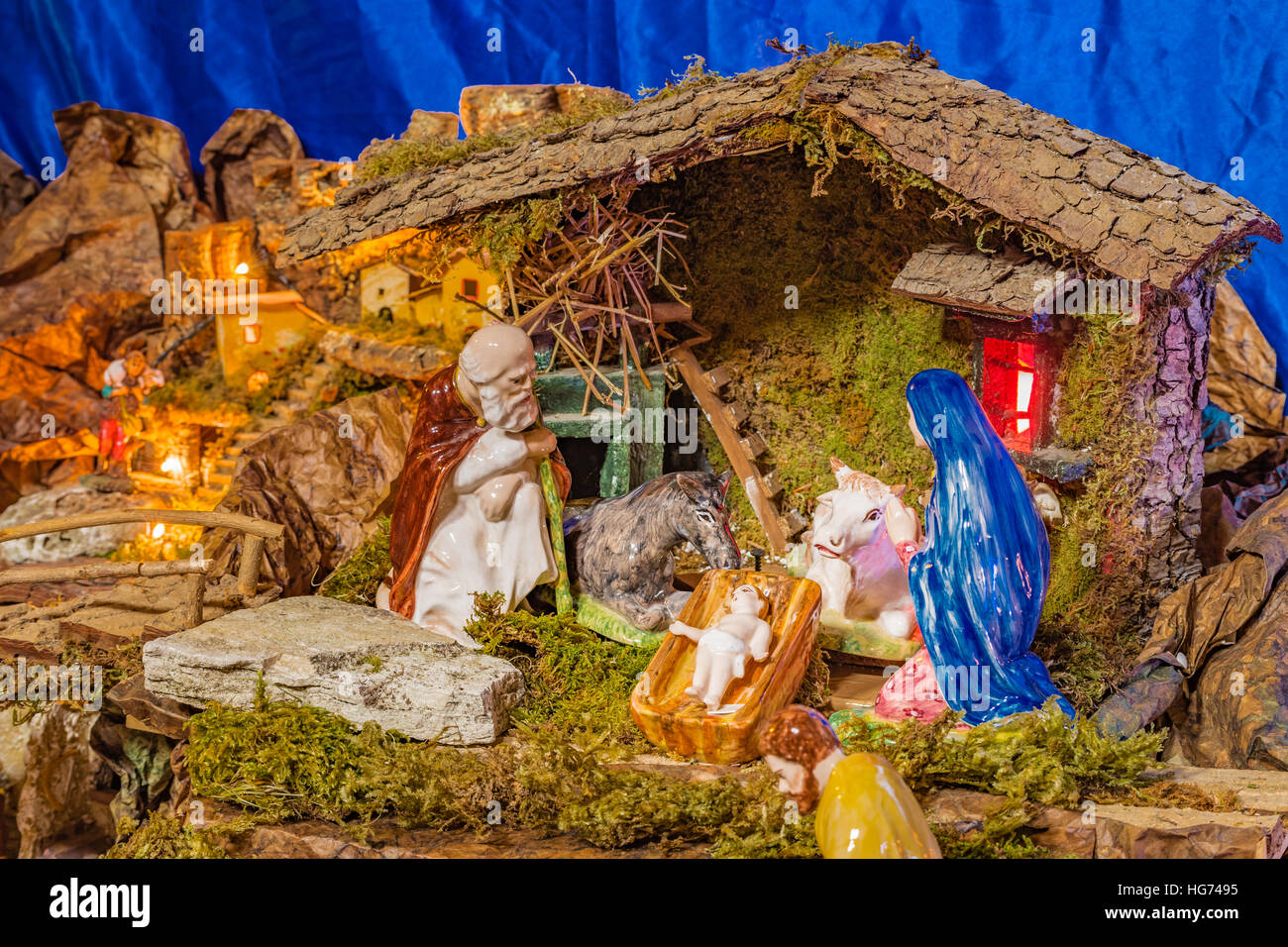 Christmas Nativity scene of baby Jesus in the manger with Saint Joseph ...