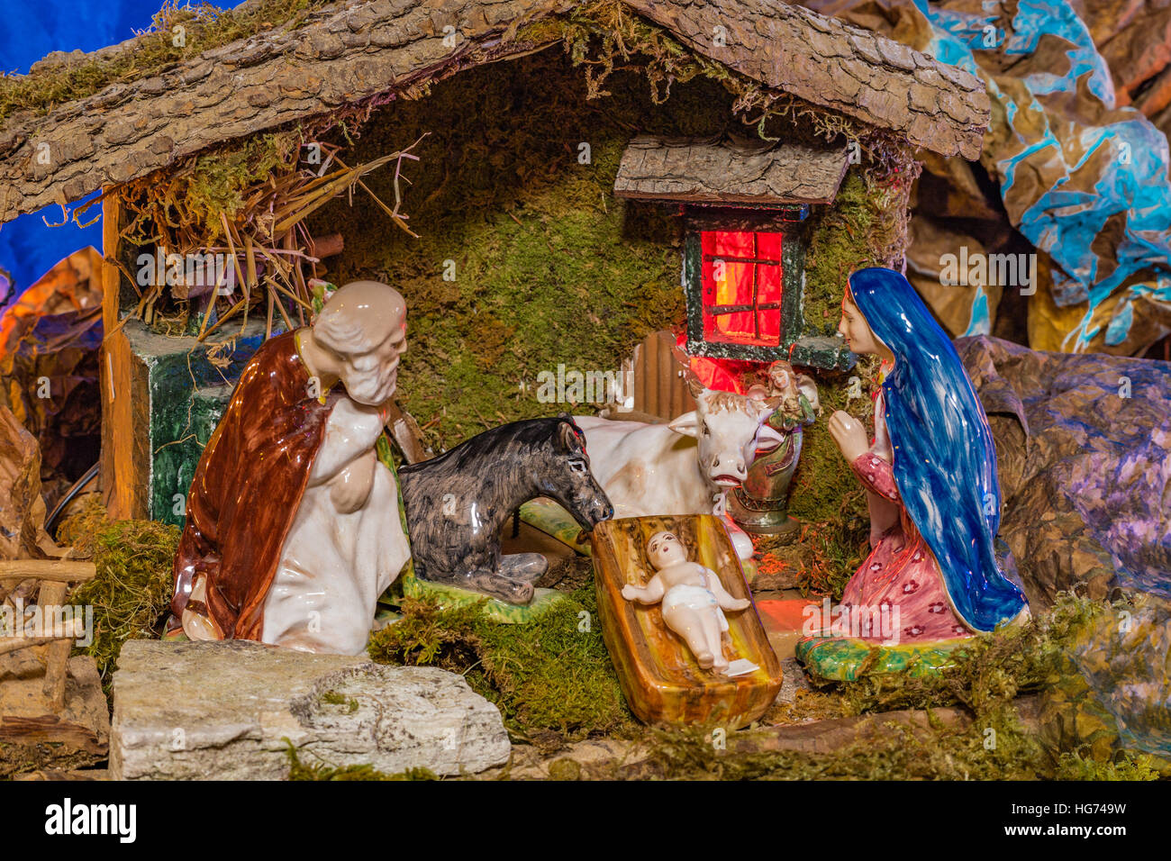 Christmas Nativity scene of baby Jesus in the manger with Saint Joseph ...