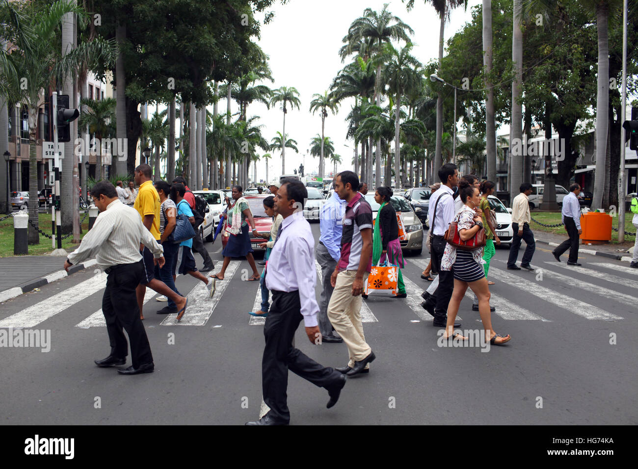 People cross busy road in Port Louis Stock Photo - Alamy