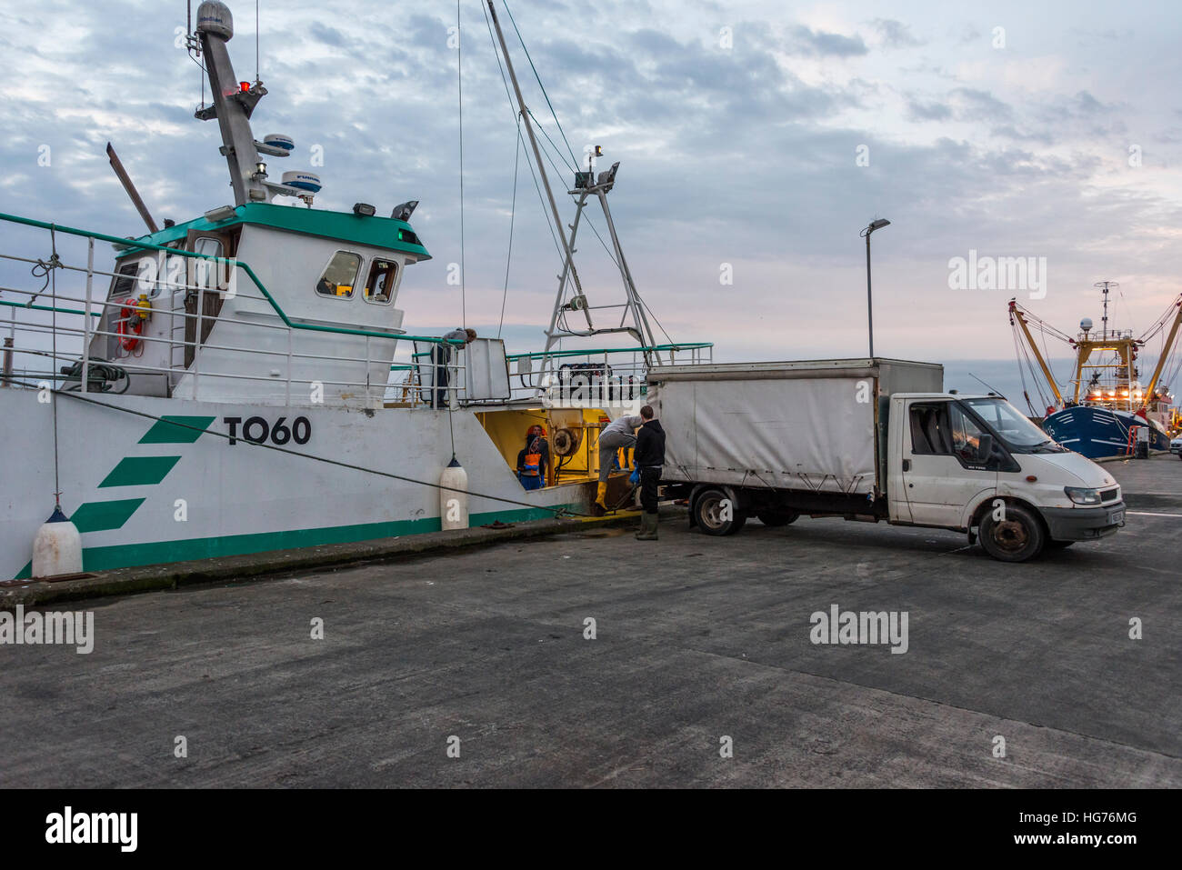 Truck loading fish hi-res stock photography and images - Alamy