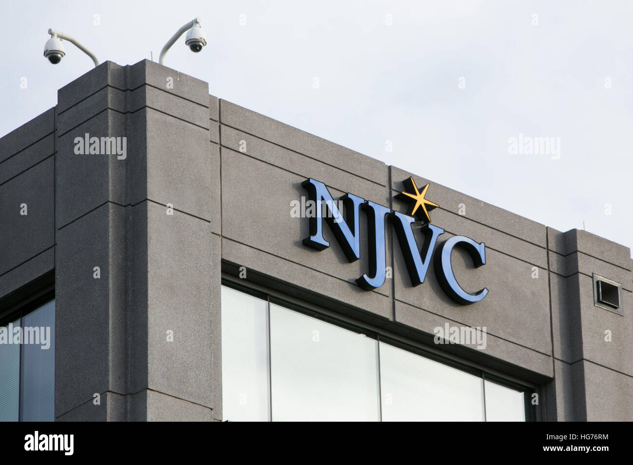 A logo sign outside of the headquarters of NJVC in Chantilly, Virginia ...
