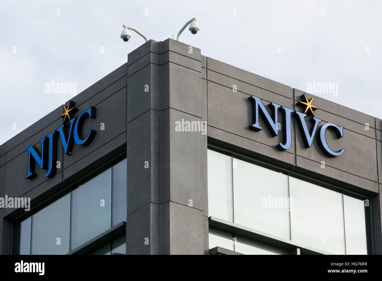 A logo sign outside of the headquarters of NJVC in Chantilly, Virginia ...