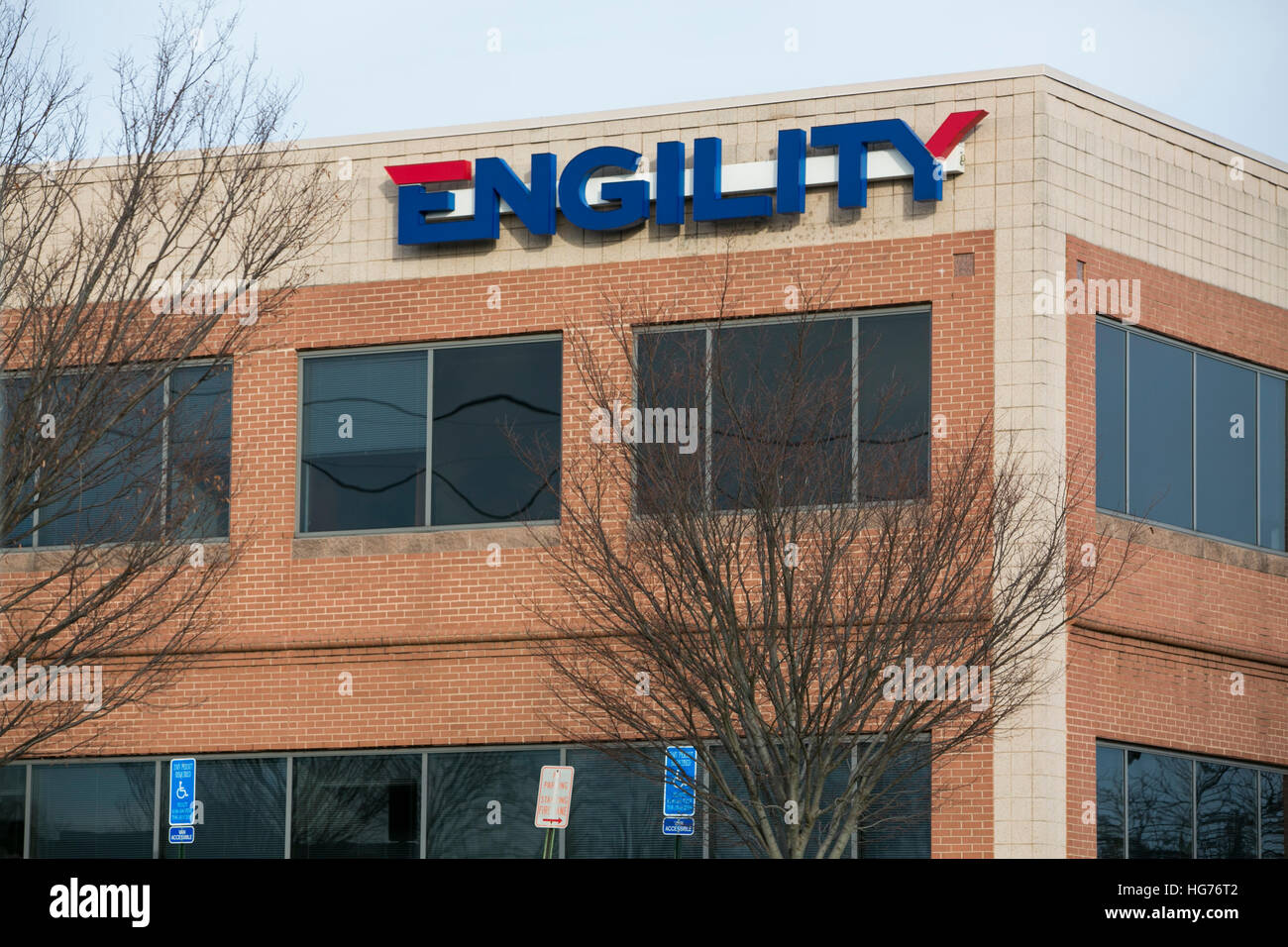 A logo sign outside of a facility occupied by The Engility Corporation ...