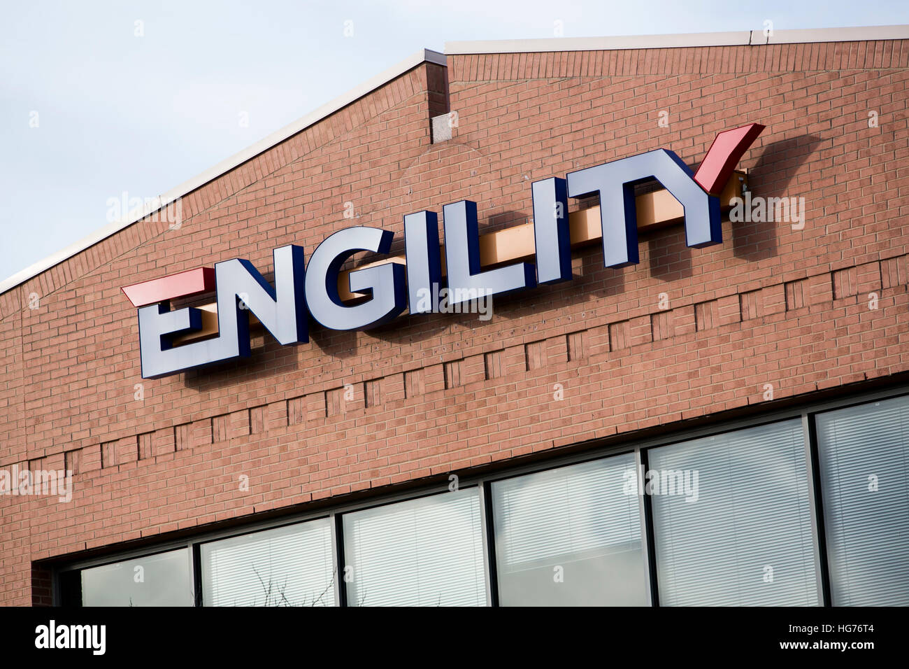 A logo sign outside of a facility occupied by The Engility Corporation ...