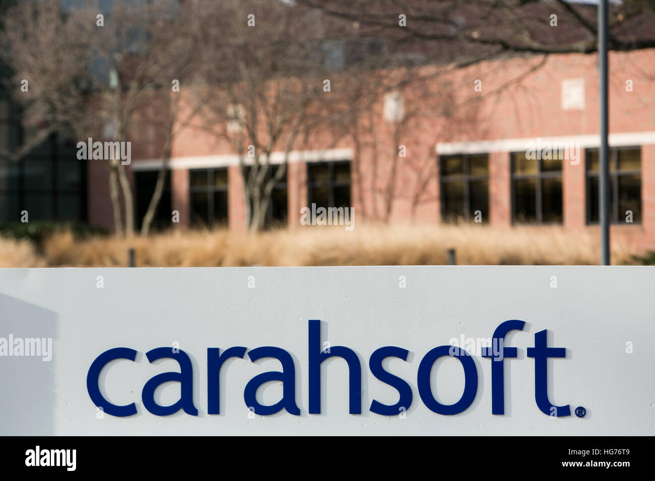 A logo sign outside of the headquarters of the Carahsoft Technology ...