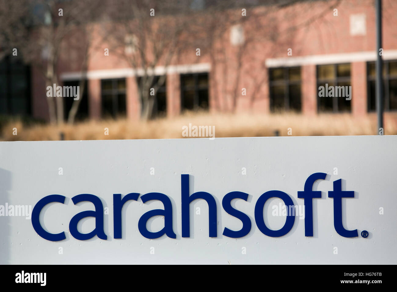 A logo sign outside of the headquarters of the Carahsoft Technology ...