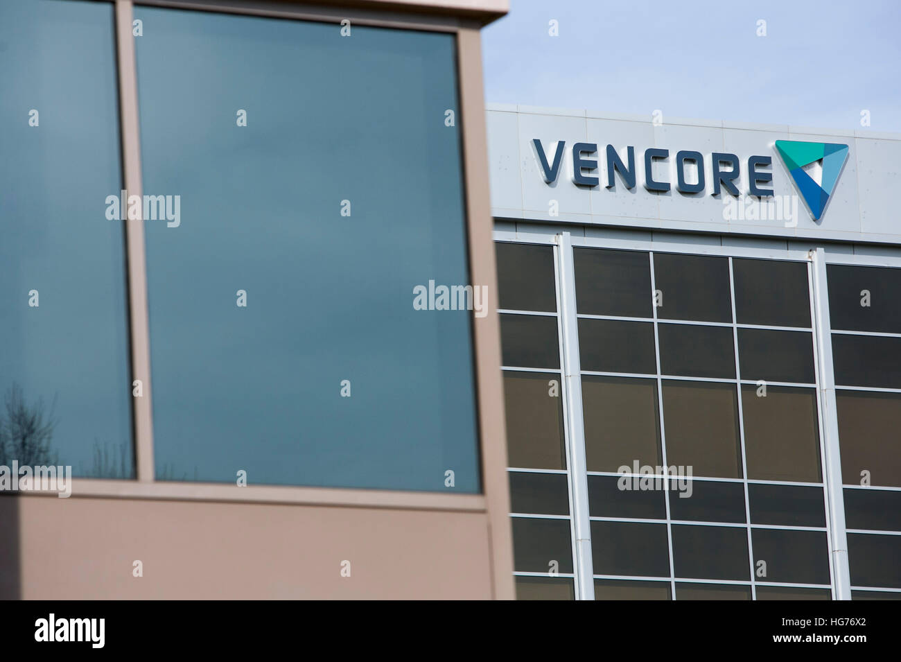 A logo sign outside of the headquarters of Vencore, Inc., in Chantilly ...