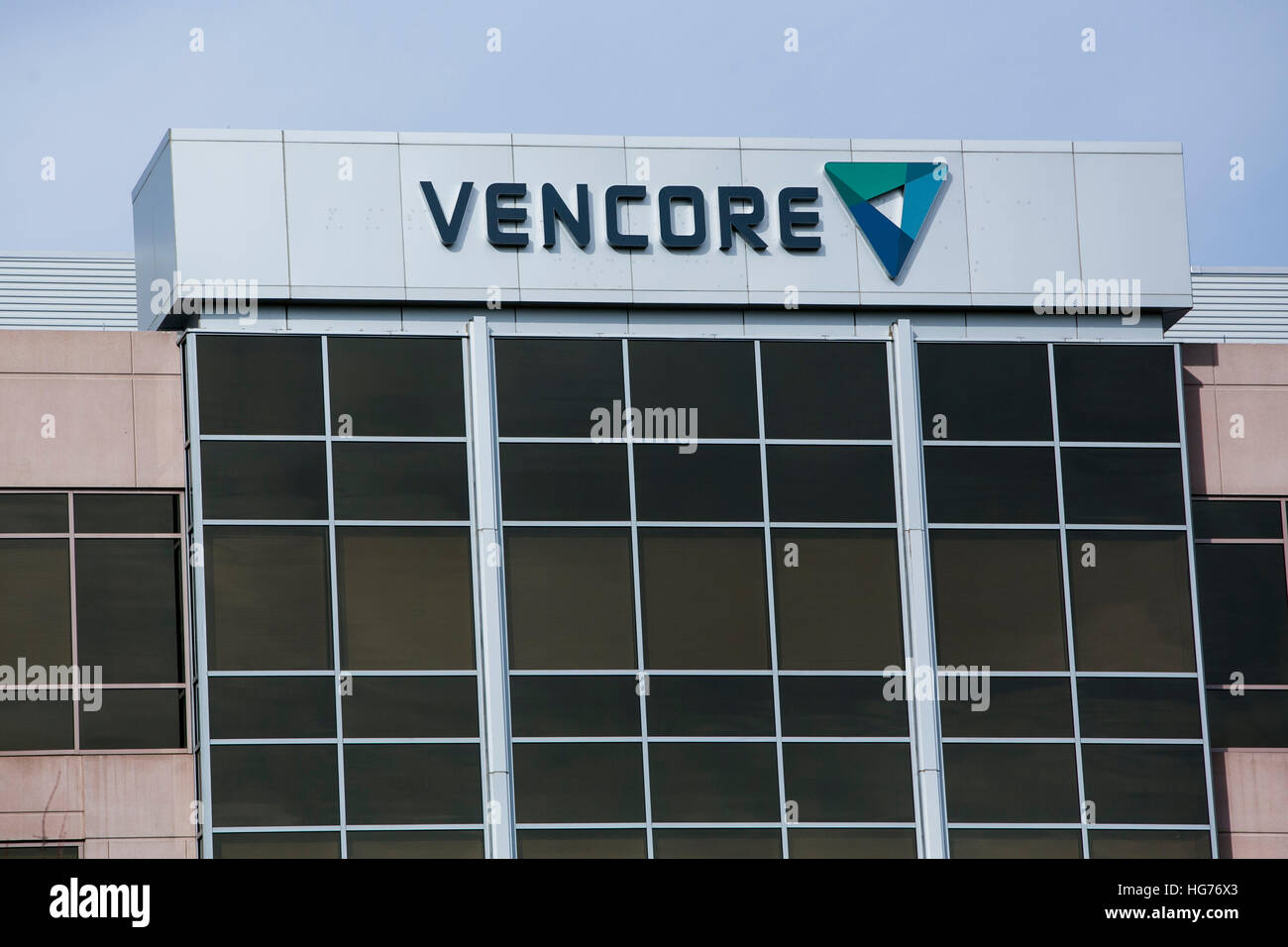 A logo sign outside of the headquarters of Vencore, Inc., in Chantilly ...