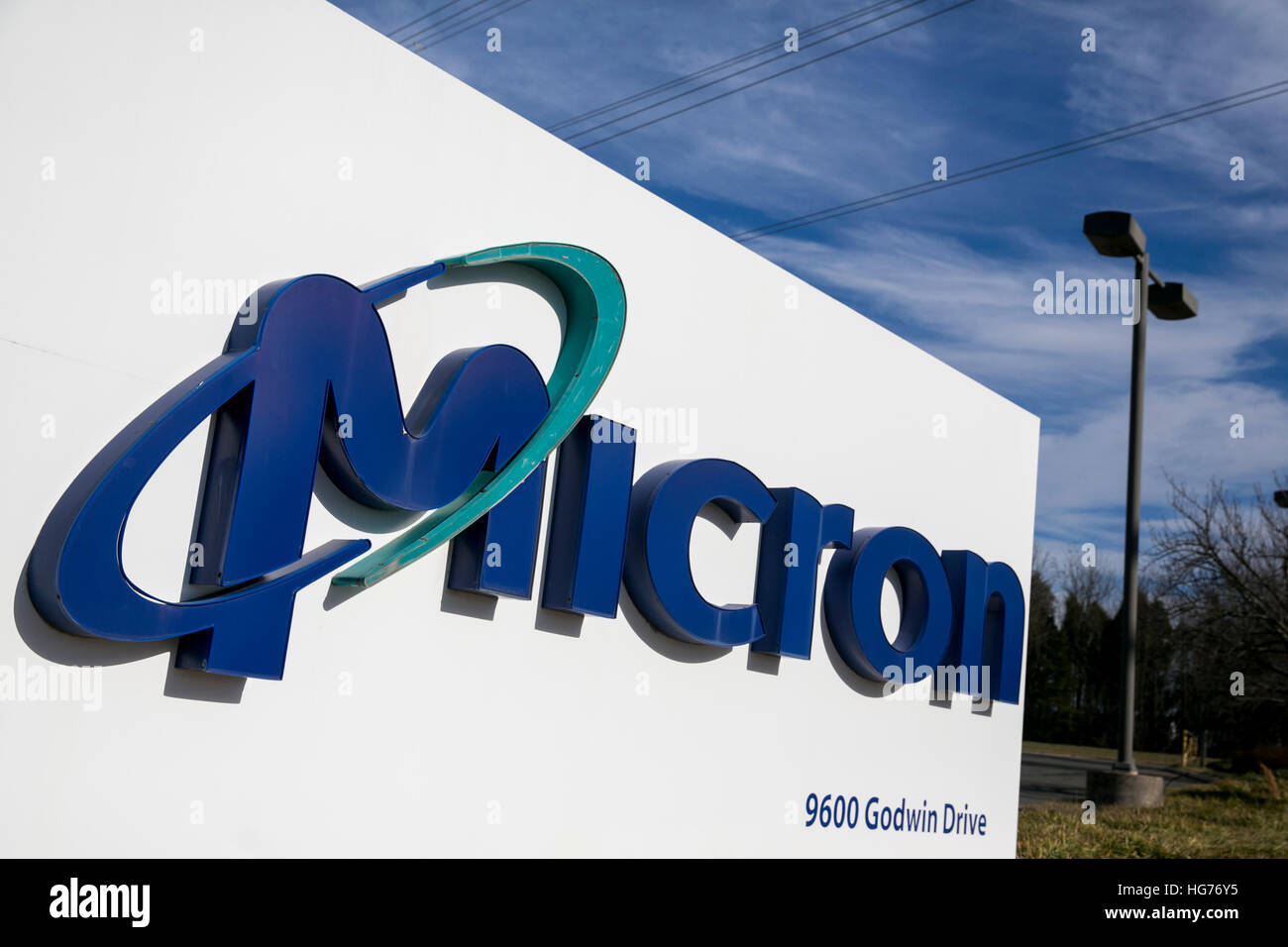A logo sign outside of a facility occupied by Micron Technology Inc ...