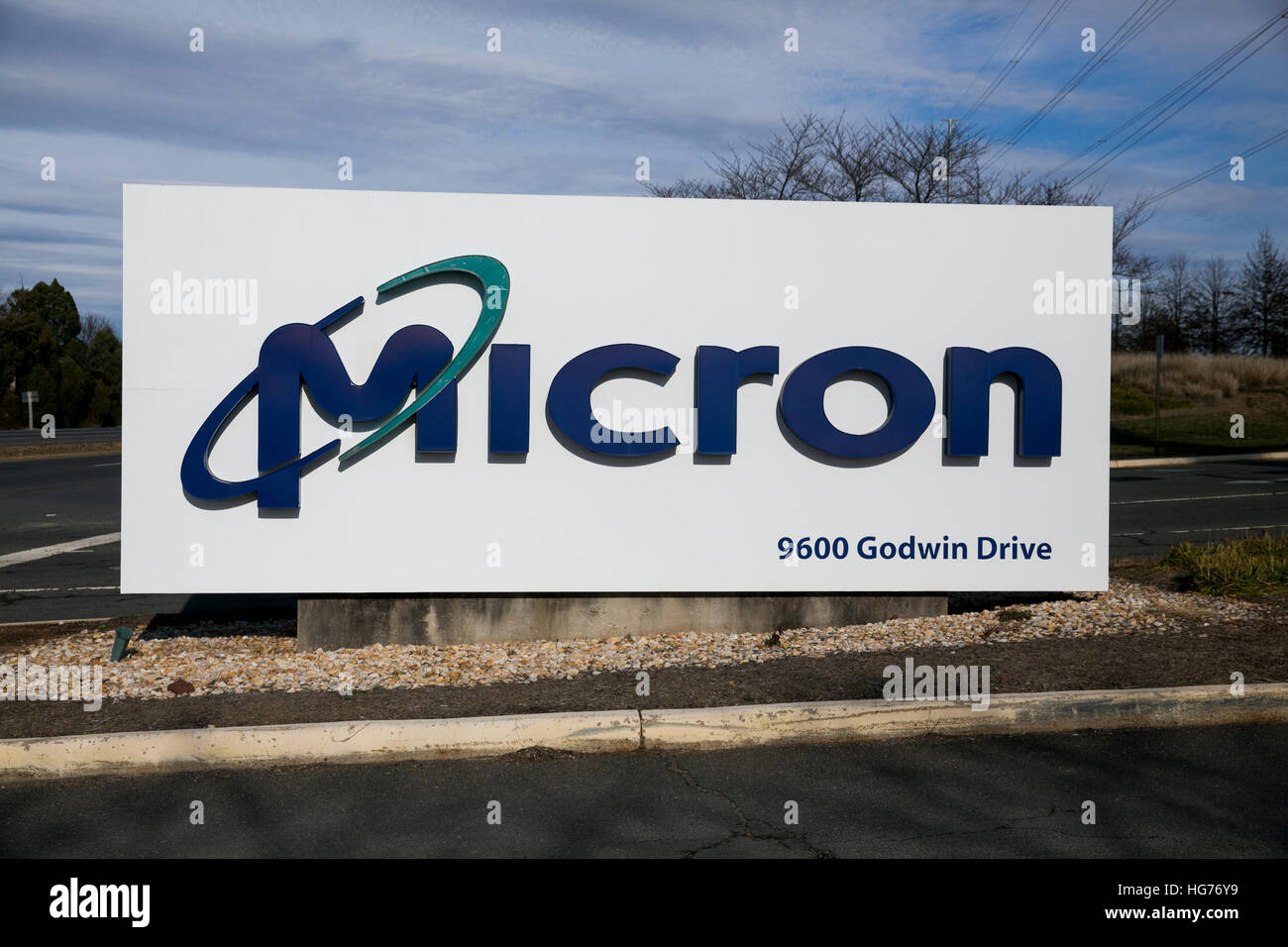 A logo sign outside of a facility occupied by Micron Technology Inc ...