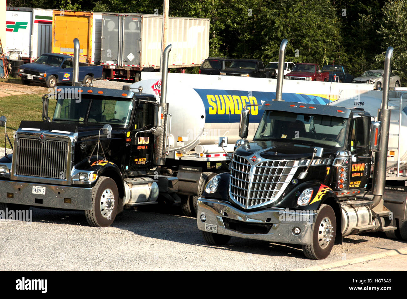 two big heavy-duty oil trucks Stock Photo - Alamy