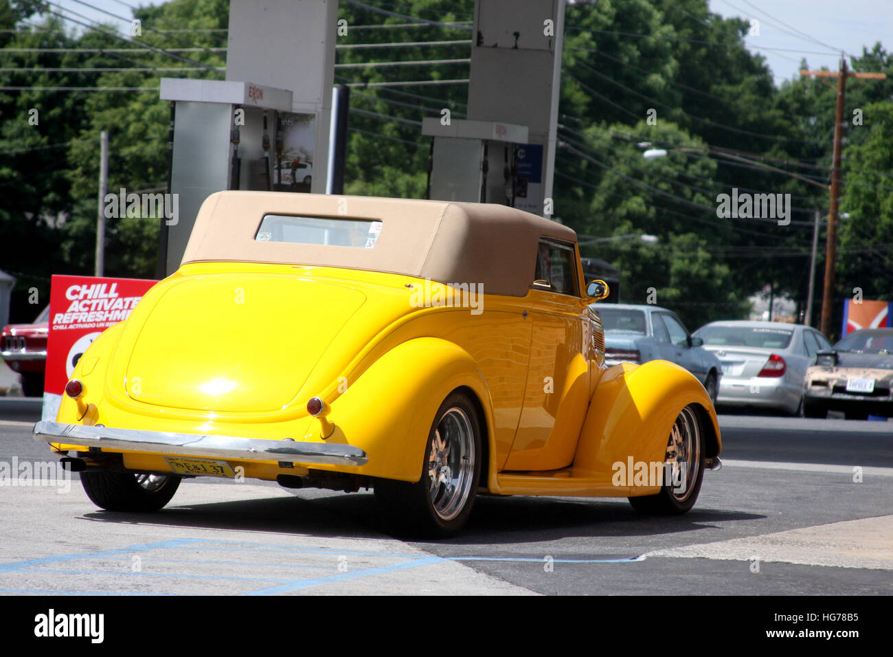 Retro/ vintage/ old/ antique yellow car on the road Stock Photo - Alamy