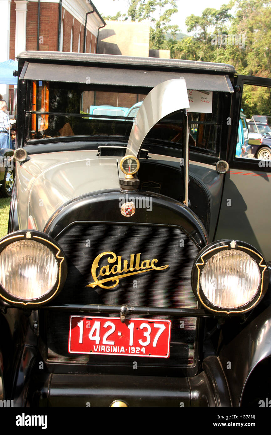Retro/ vintage/ old/ antique car. Cadillac with open hood Stock Photo ...