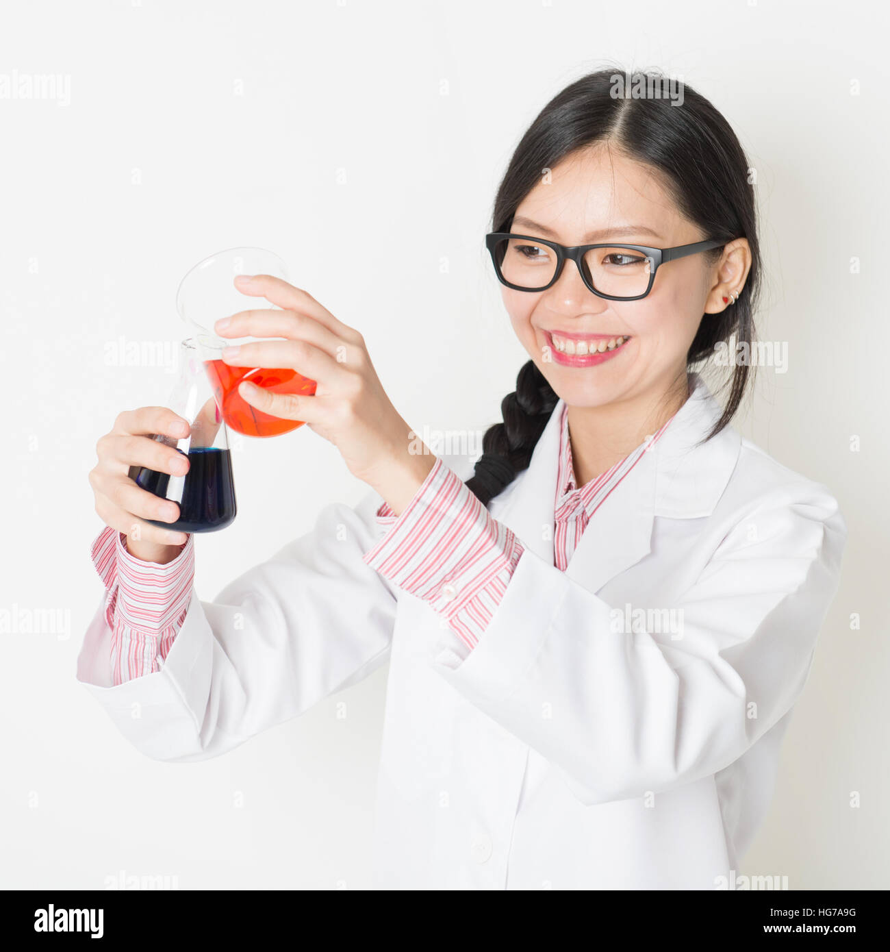 Young Asian Chinese female student in microbiological class. Research ...