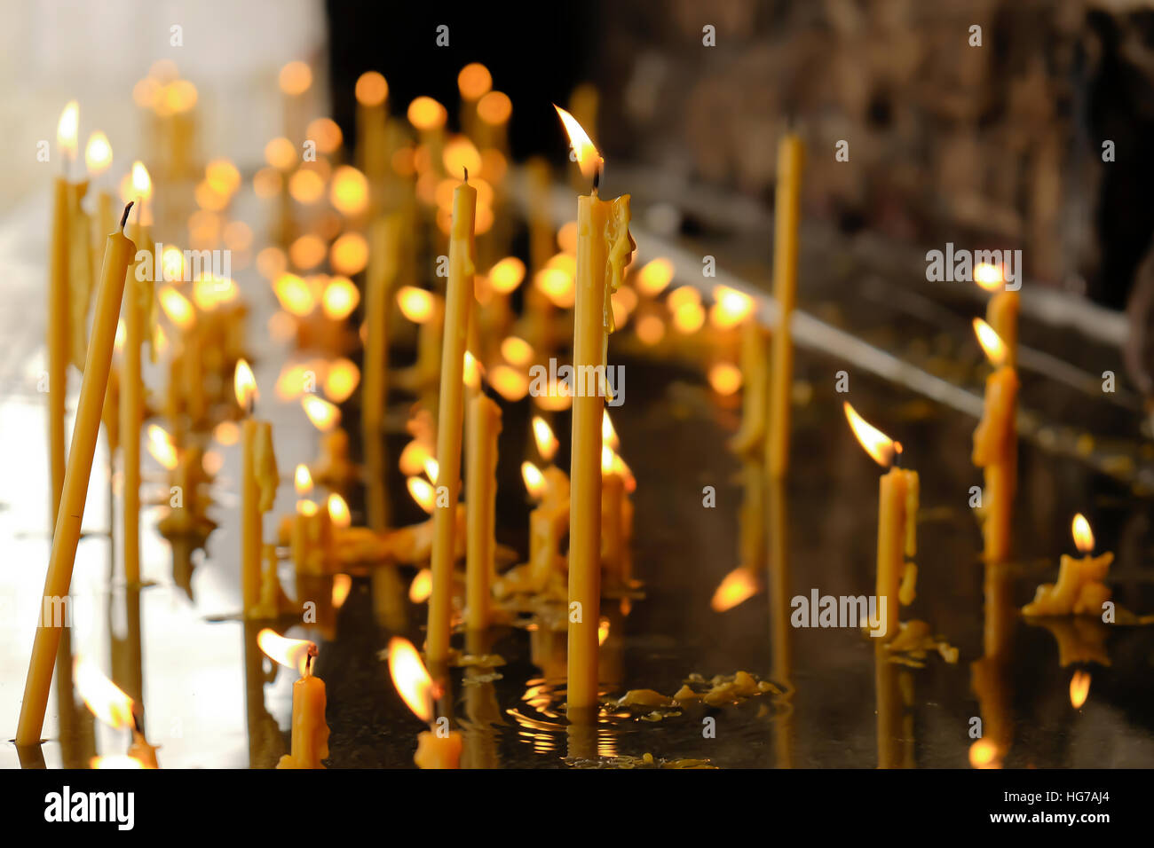 Candle lit mass hi-res stock photography and images - Alamy
