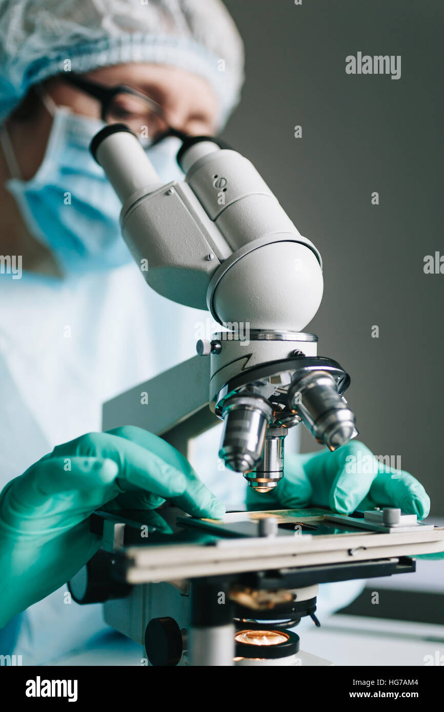 Researching microscope hi-res stock photography and images - Alamy