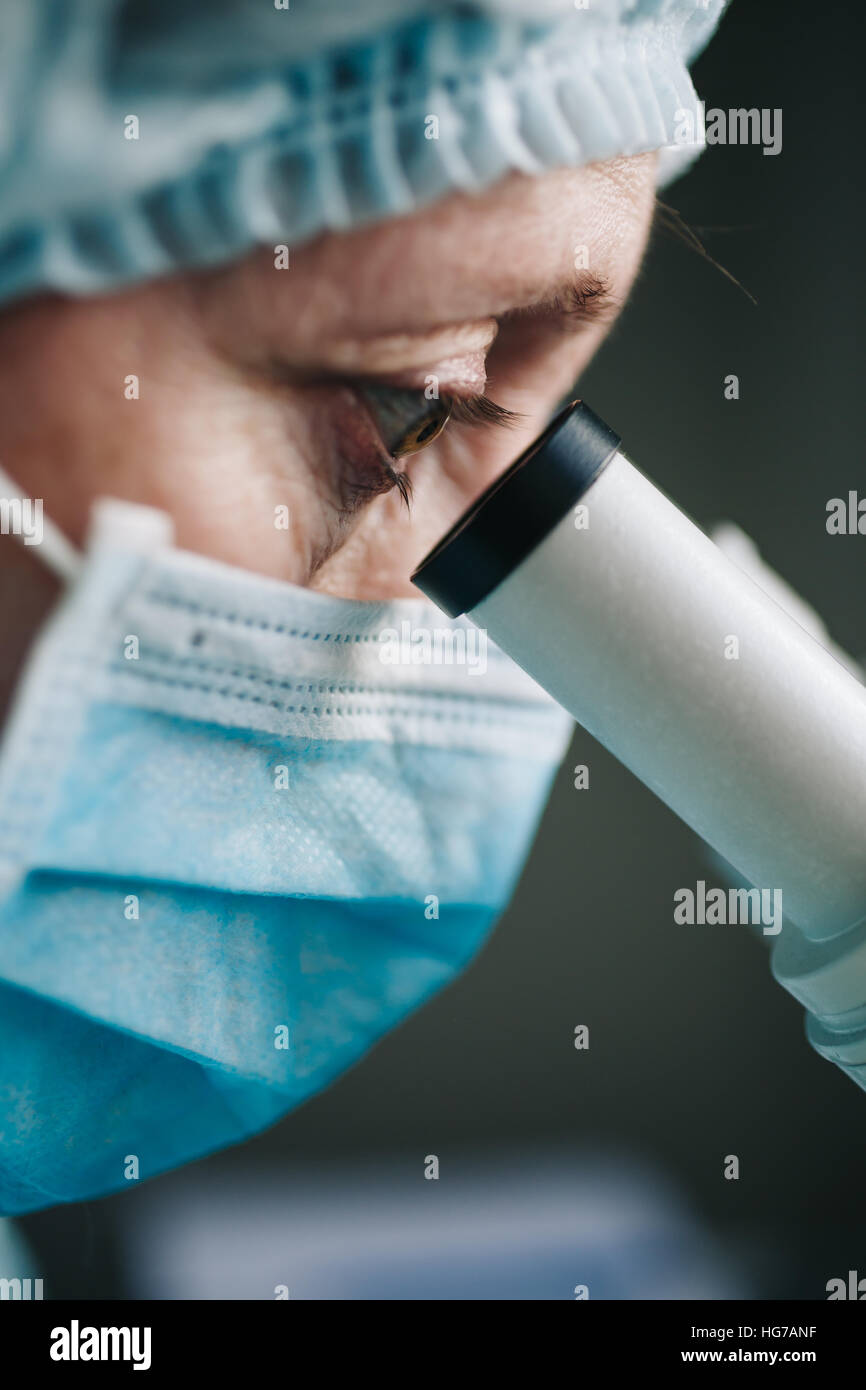 Close up view of scientist eye Stock Photo - Alamy