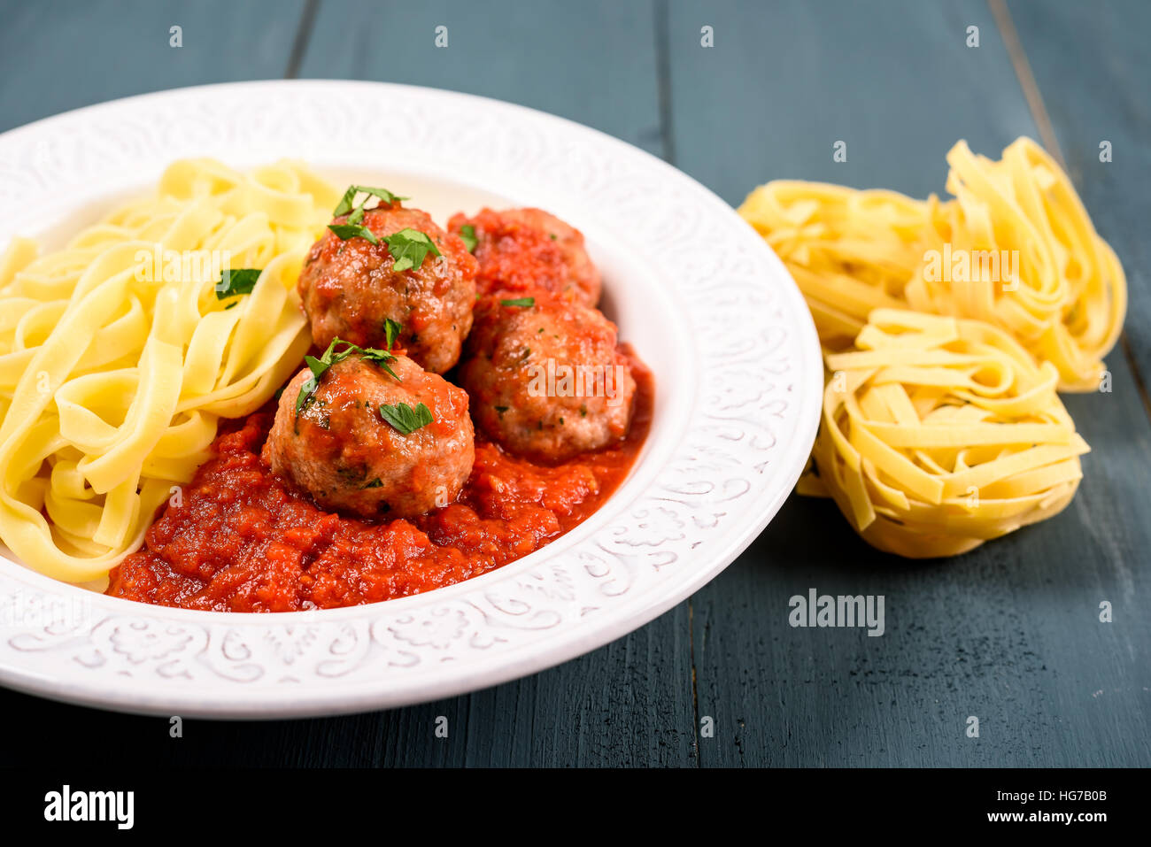 Italian Tagliatelle Pasta With Harissa Turkey Meatballs Stock Photo - Alamy