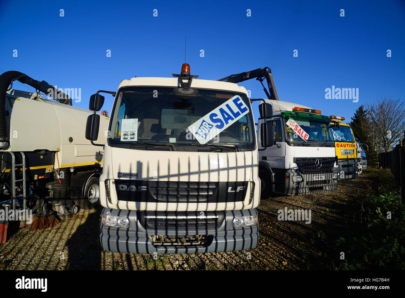 for sale sign in window of secondhand lorry at dealership uk Stock ...