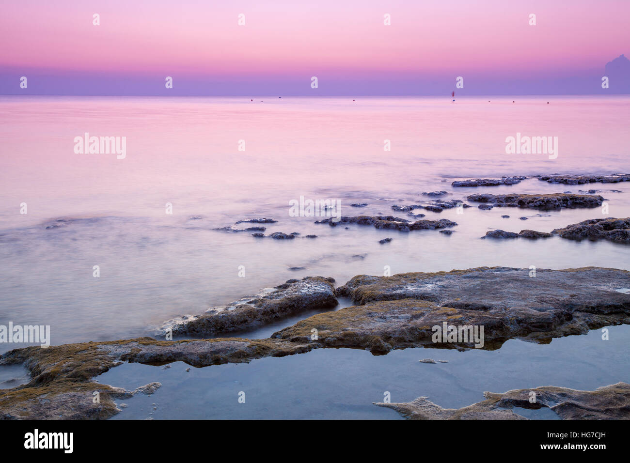 Early morning, pink sunrise over the sea Stock Photo - Alamy