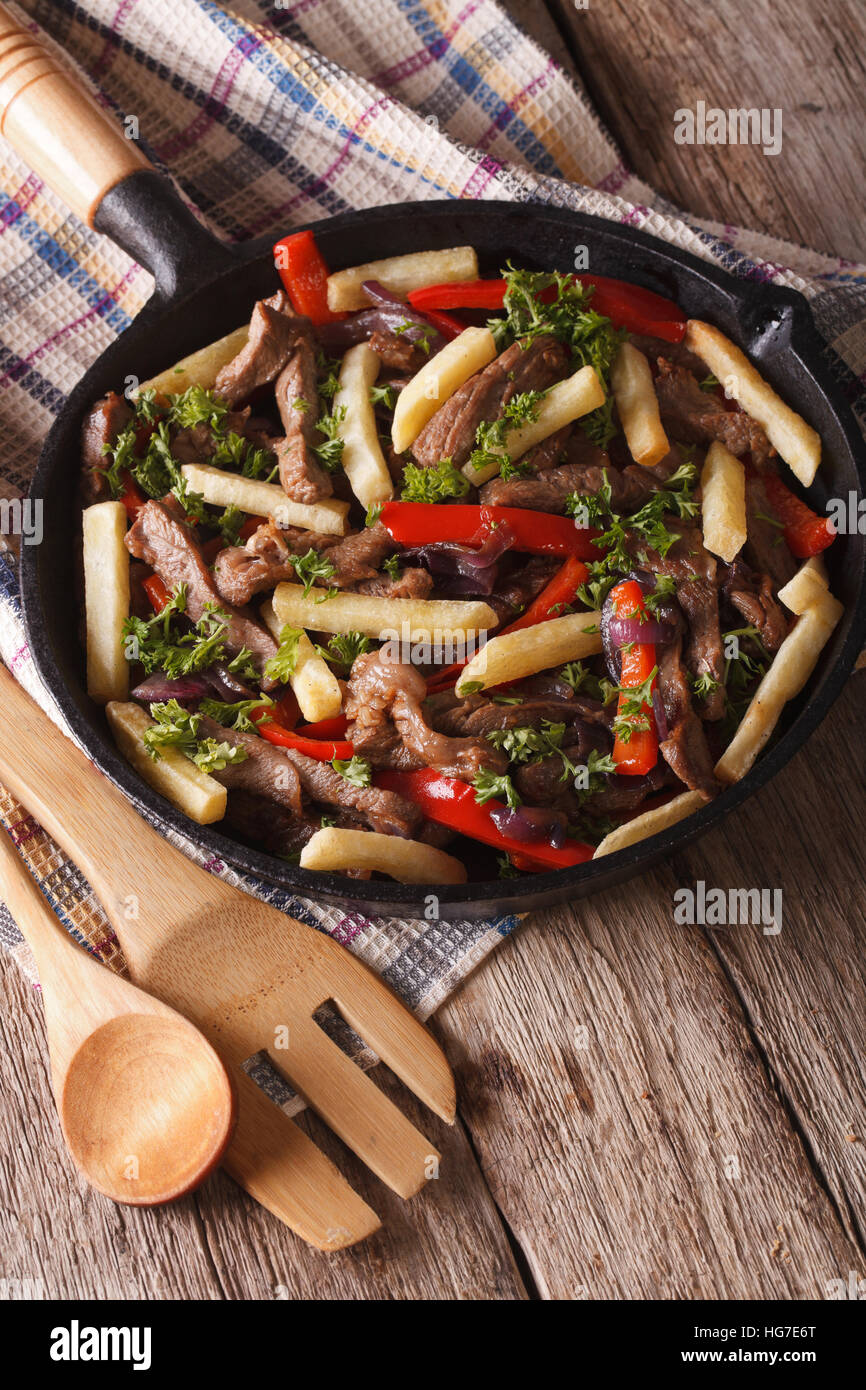Homemade Peruvian cuisine: lomo saltado in a frying pan close-up ...