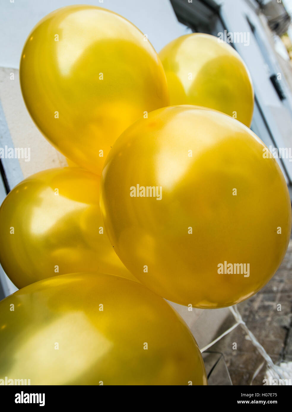 Yellow balloons hi-res stock photography and images - Alamy