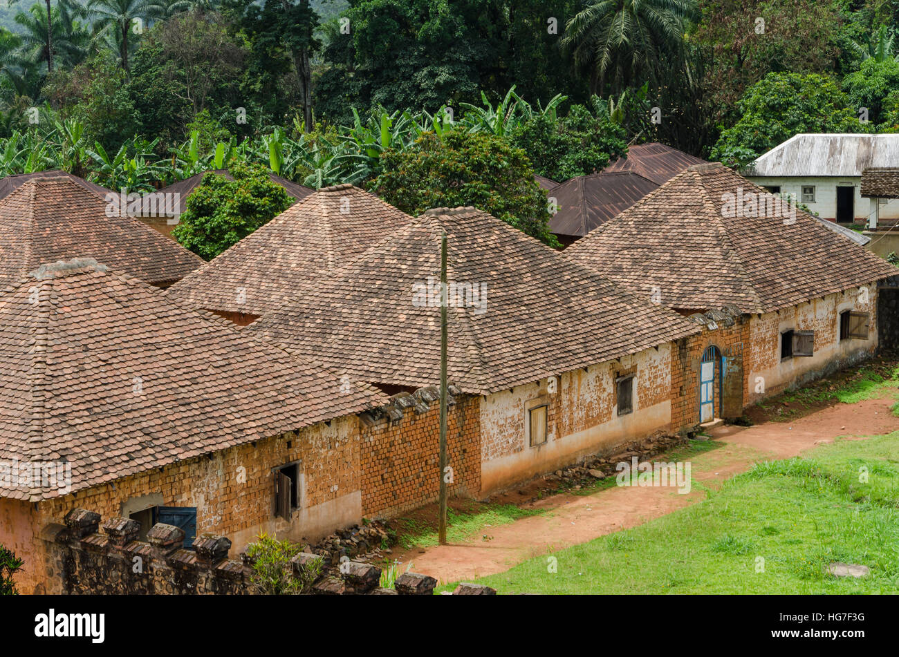 Traditional palace of the Fon of Bafut with brick and tile buildings ...