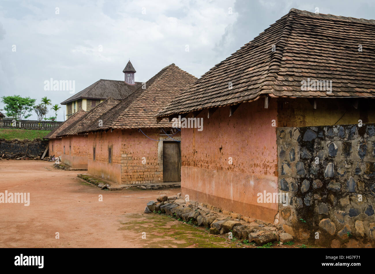 Traditional palace of the Fon of Bafut with brick and tile buildings ...