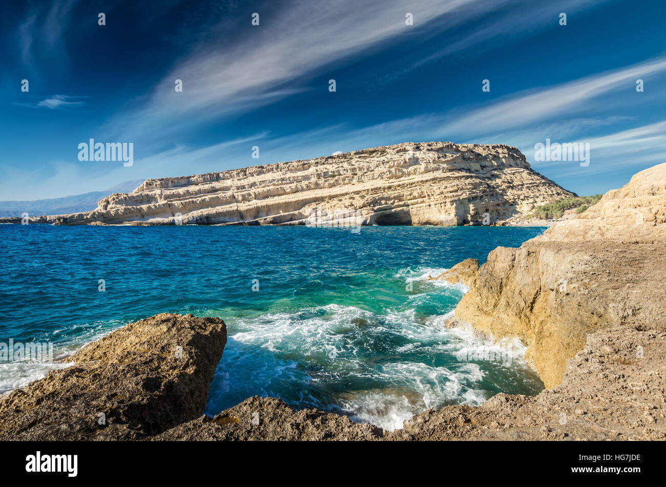 Matala beach on Crete island, Greece. View from the rocks. There are ...