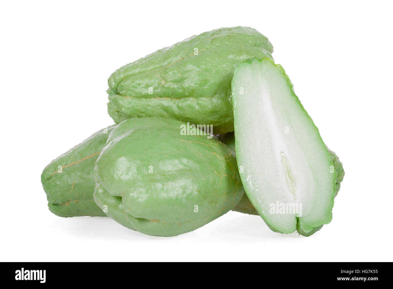 Chayotes isolated on white background, with one Chayote cut in half ...