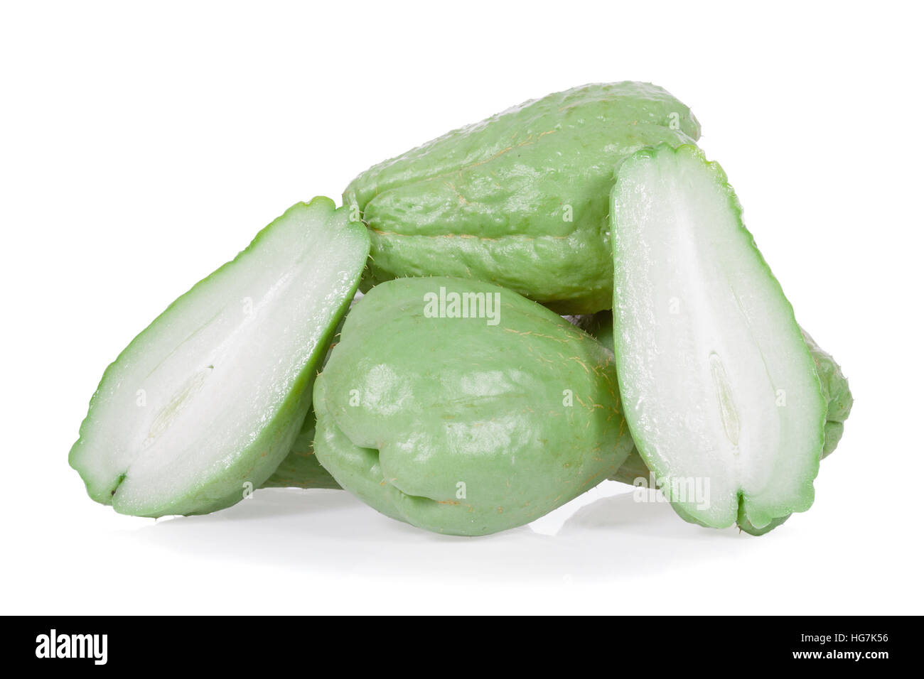 Chayotes isolated on white background, with one Chayote cut in half ...