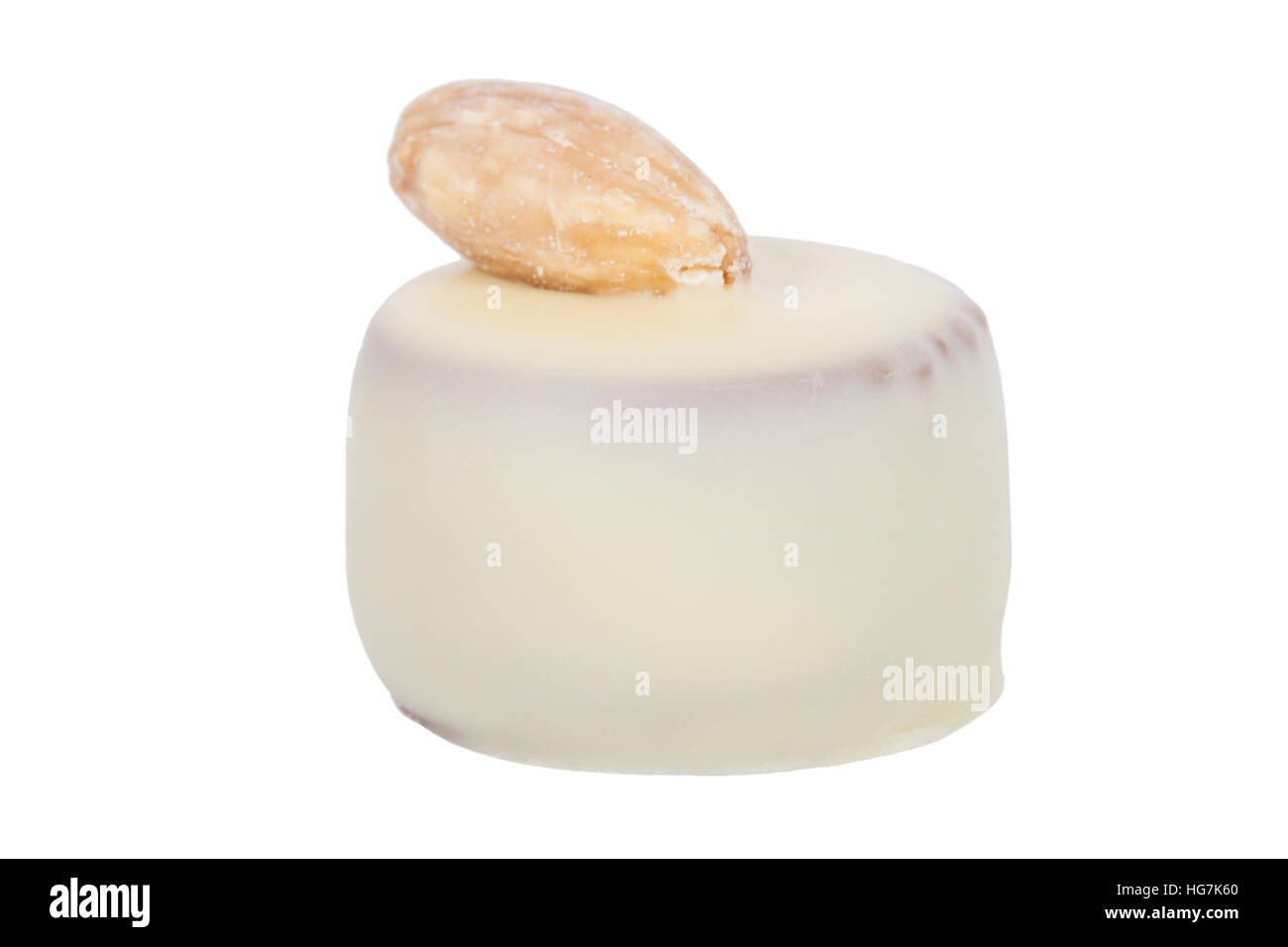 Gourmet bonbon, aka bon-bon or truffle made of white chocolate. Closeup ...