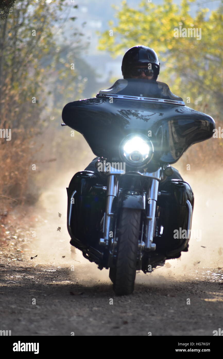 RIde Through Dust Stock Photo - Alamy