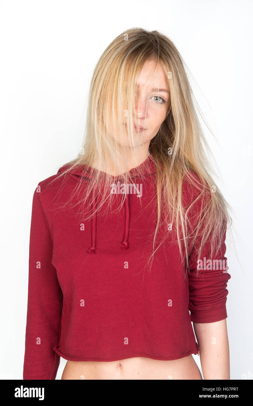 Portrait of a beautiful glam model with provocative makeup wearing red ...