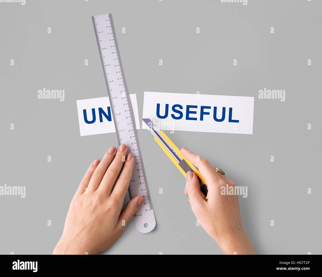 Unuseful Unhelpful Hands Cut Word Split Concept Stock Photo - Alamy