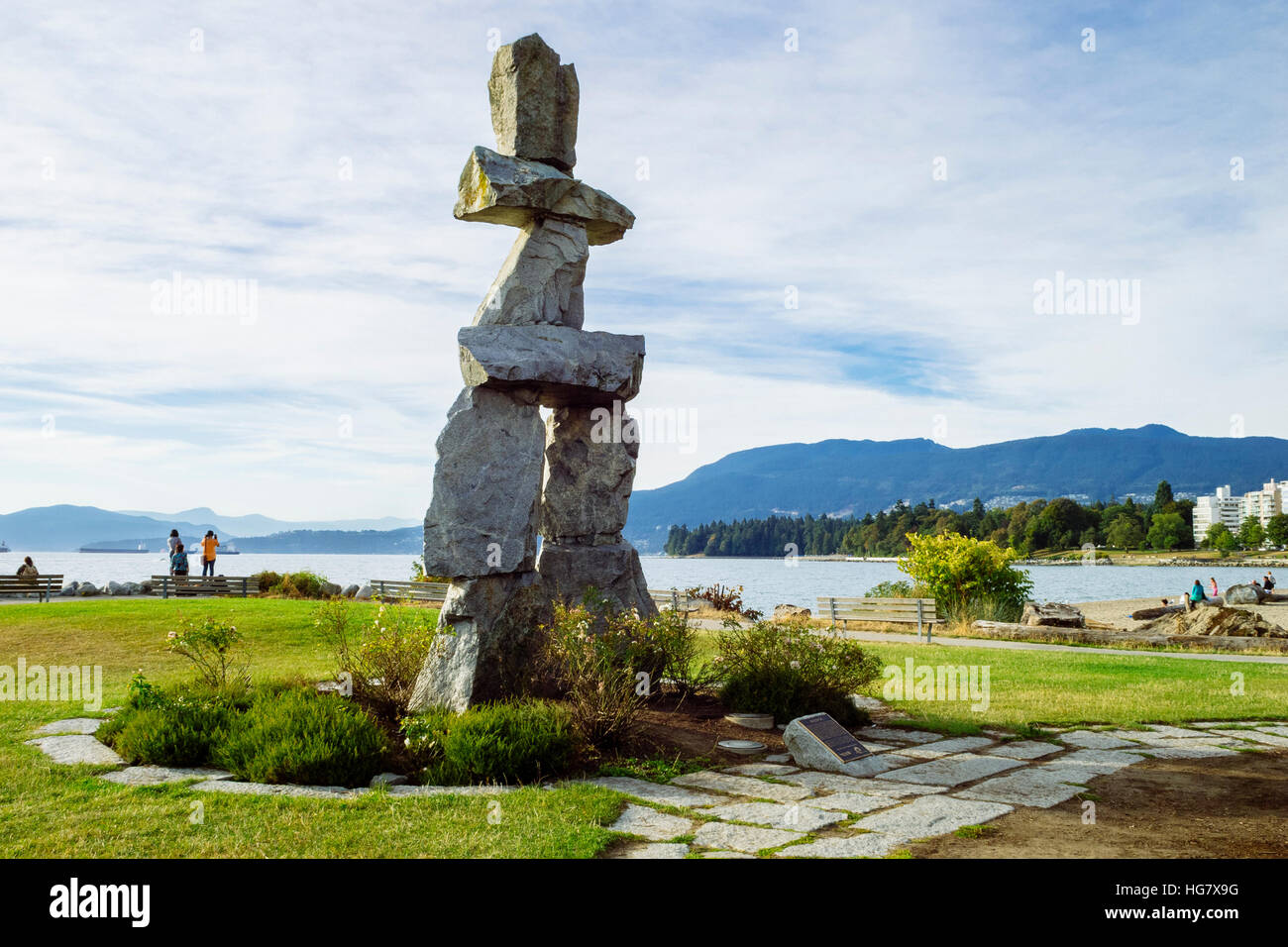 Stone landmark, Inukshuk, situated on English Bay in Vancouver, British ...